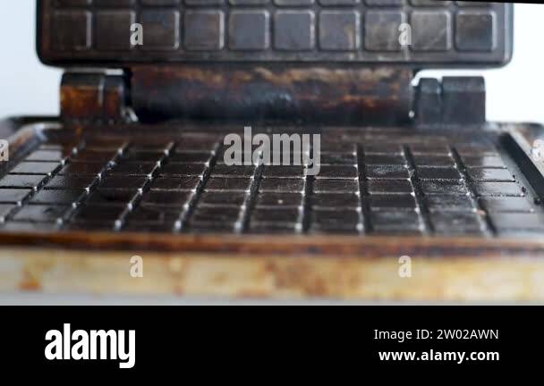 Old waffle maker toaster electric for baking delicious waffles .Red-hot ...