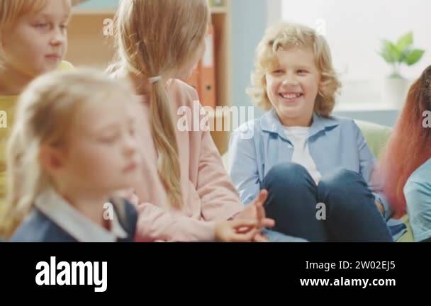 Elementary School Creativity Class: Children Sitting together on the ...