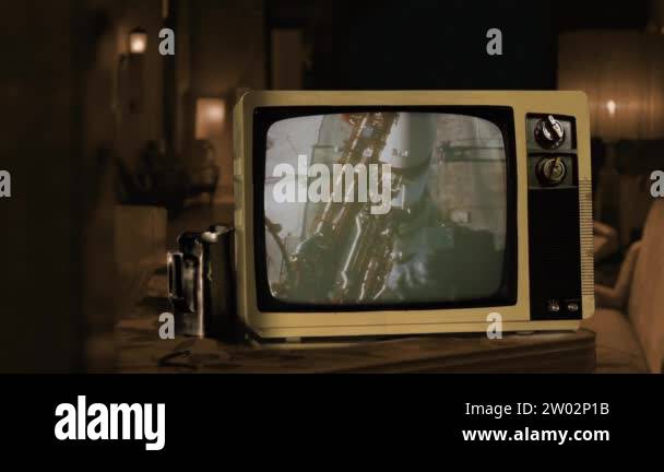 Apollo 11 launches from Kennedy Space Center Cape Canaveral in 1969. Seen on a Retro TV. Sepia ...