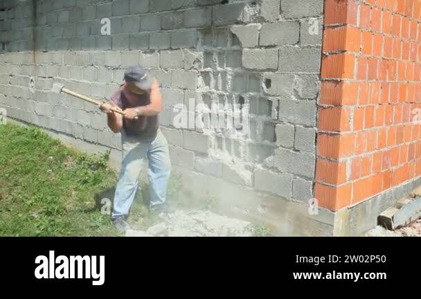 Knocking down wall Stock Videos & Footage - HD and 4K Video Clips - Alamy