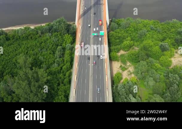 Car driving on highway bridge and road intersection in modern city ...