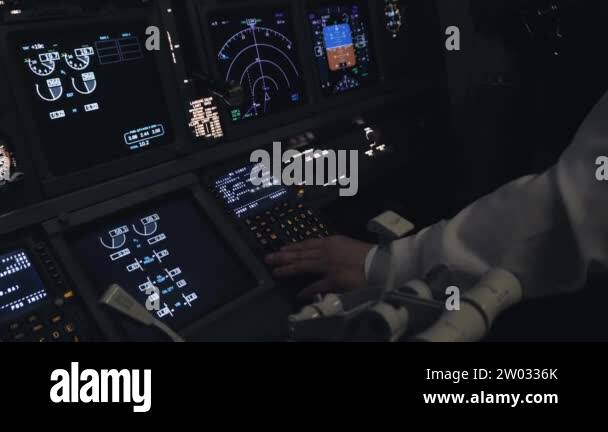 Pilot sets the course inside the airplane cockpit Stock Video Footage ...