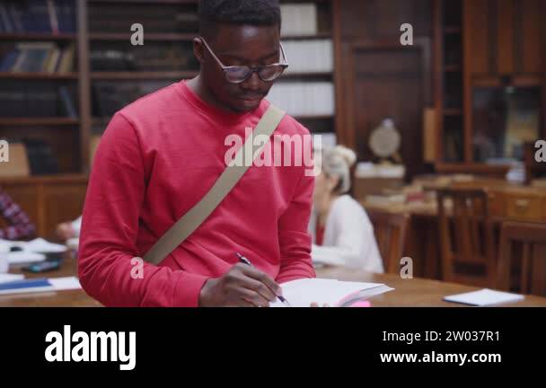 Student black man reading Stock Videos & Footage - HD and 4K Video ...