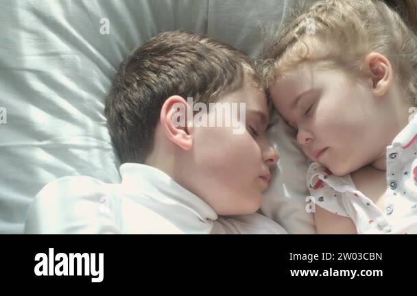 Little Boy And Girl Are Sleeping Together On Bed In Bedroom Brother 0913