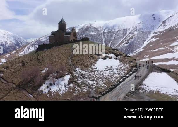 Gergeti Trinity Church, also known as the Holy Trinity Temple. Aerial ...