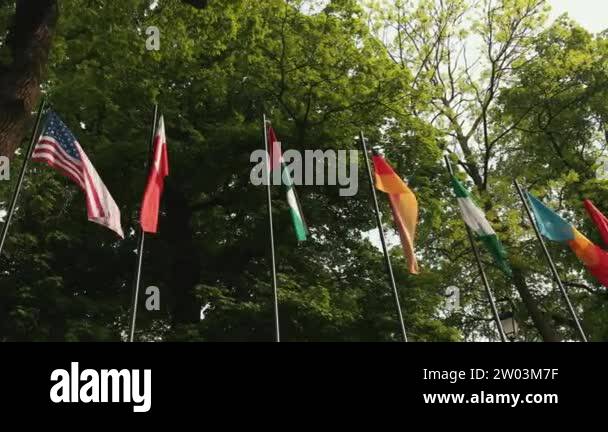 Panorama from left to right with flags of different states standing on ...