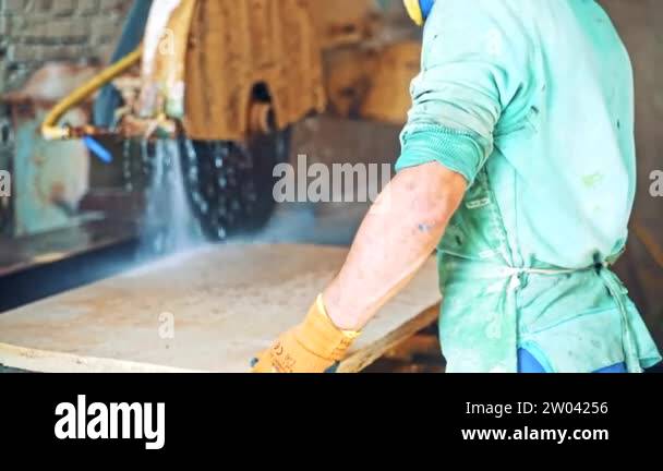Man worker controls the factory CNC machine. Automated machine for ...