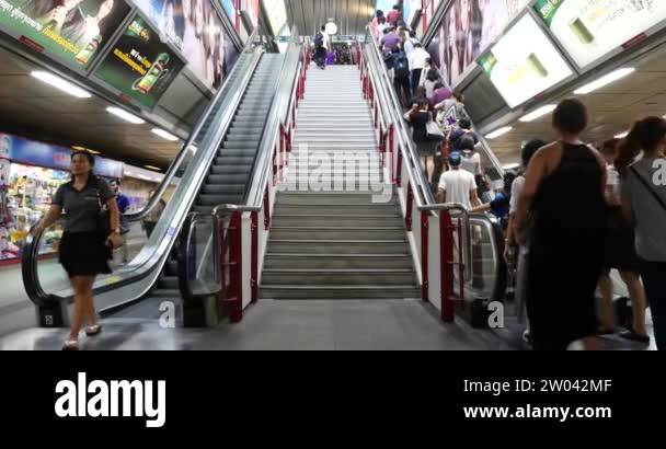BANGKOK, THAILAND - NOVEMBER 19, 2015: Travellers inside BTS Skytrain ...