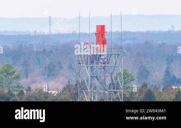 Radar Communications Tower with Spinning Turning Red Antenna at ...