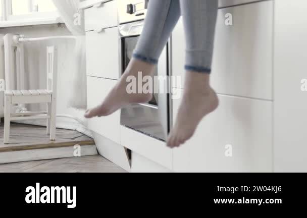 Woman sitting on stool legs crossed Stock Videos & Footage - HD and 4K ...