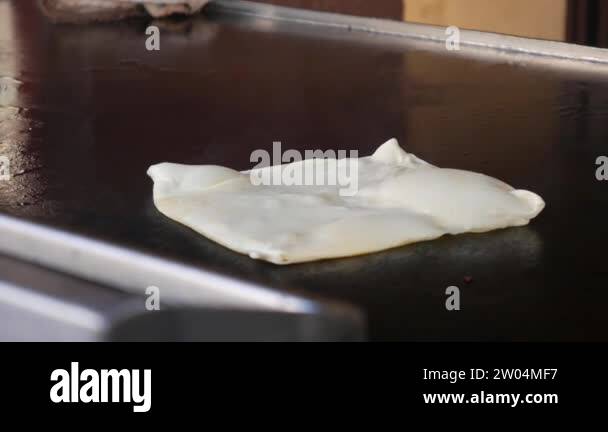 Chef making traditional Indian food called Roti Canai. 4k Stock Video ...