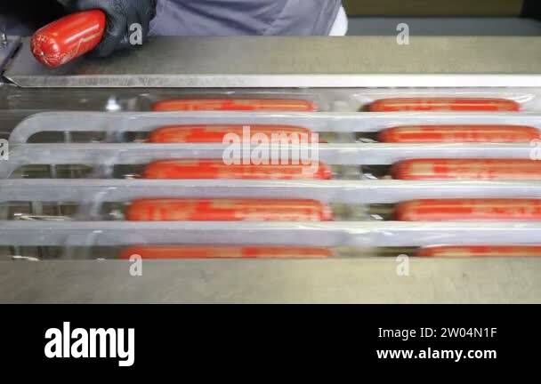 Vacuum Packaging of Processed Meat. Meat industry. Food packaging ...