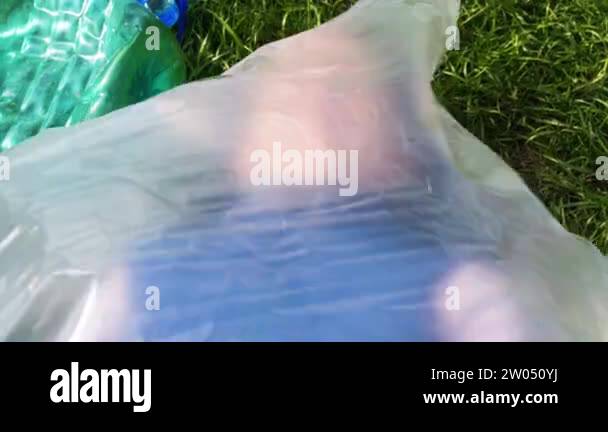 Woman lying inside plastic bag Stock Videos & Footage - HD and 4K Video ...