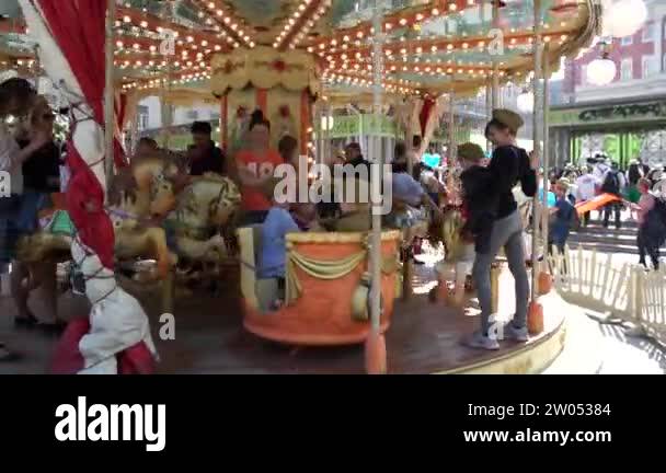 MOSCOW, RUSSIA - MAY 09, 2019: Kids on carousel merry-go-round ...