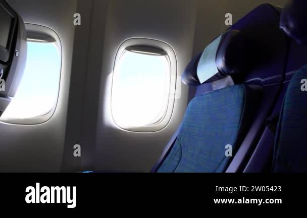 4k, Traveling by air. Rows of seats cabin in the interior airplane ...