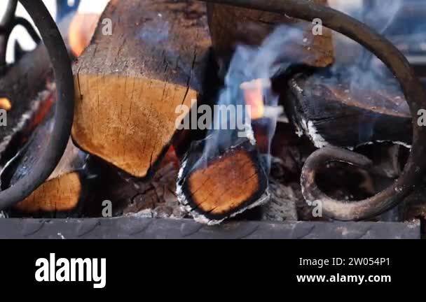 Lit a fire. Built-in BBQ. The smoke from the fire. Open flame. High ...