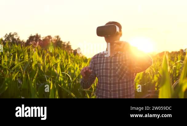 Smart farming with IoT, futuristic agriculture concept : Farmer wears ...