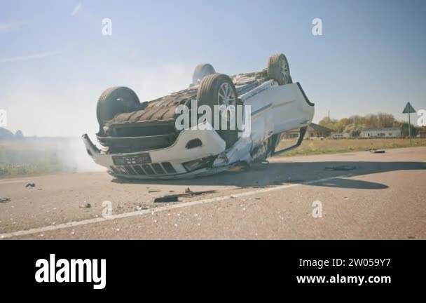 Horrific Traffic Accident, Rollover Smoking and Burning Vehicle Lying ...