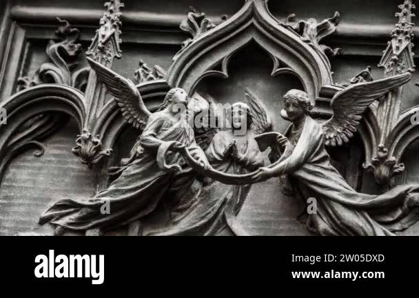 Beautiful Duomo di Milano iron gates decor in close up.Jesus Christ ...