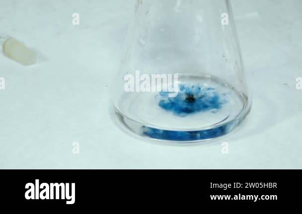Mix the reagent with water in the measuring flask. Staining of the ...