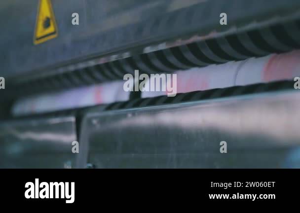 Automated wallpaper production line. Wallpaper production process in a ...