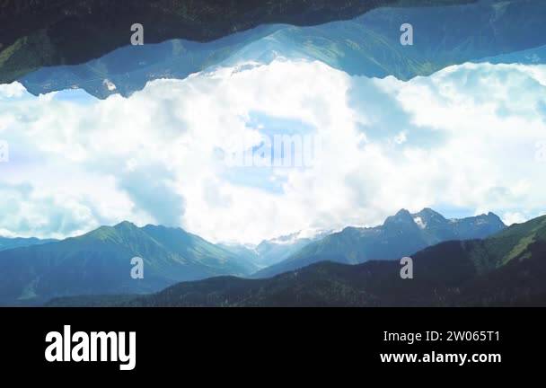 Panorama of mountains with mirror image effect. Shot. Beautiful top ...