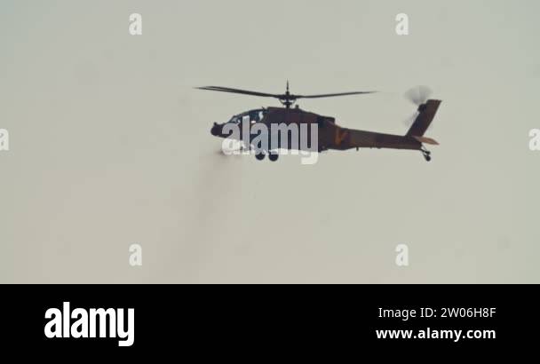 AH-64D Apache Longbow military helicopter during combat flight Stock ...