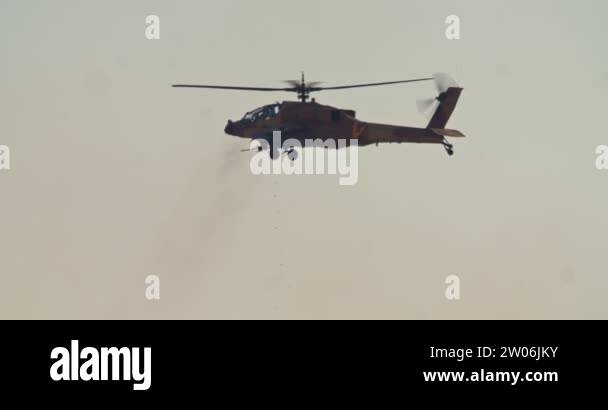 AH-64D Apache Longbow military helicopter during combat flight Stock ...