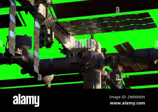 space station rotating at the space, render 3d on a green background ...