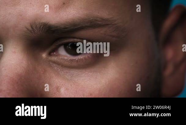 The human eye is depicted very closely with the brown (hazel) color of ...