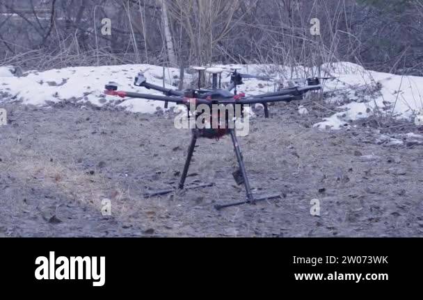 Close-up of quadcopter takes off. Clip. Powerful model of new ...