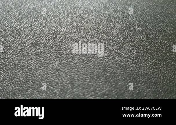 Fake leather texture details shiny surface 4K 2160p 30fps UHD tilting ...