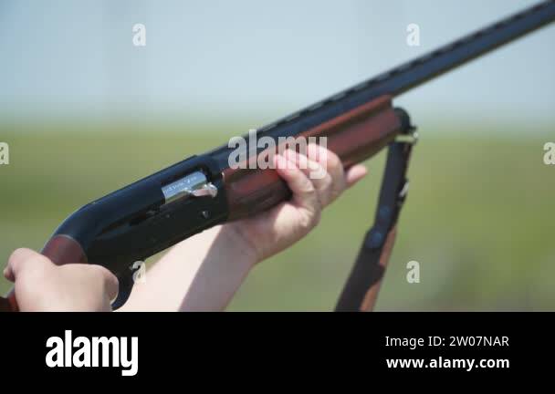 Up-to-date rifle shooting and cartridge case flying out breaching lock ...