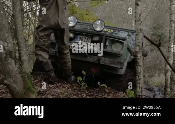 Pulling off a 4x4 offroad vehicle stuck on the tree FS700 Stock Video ...