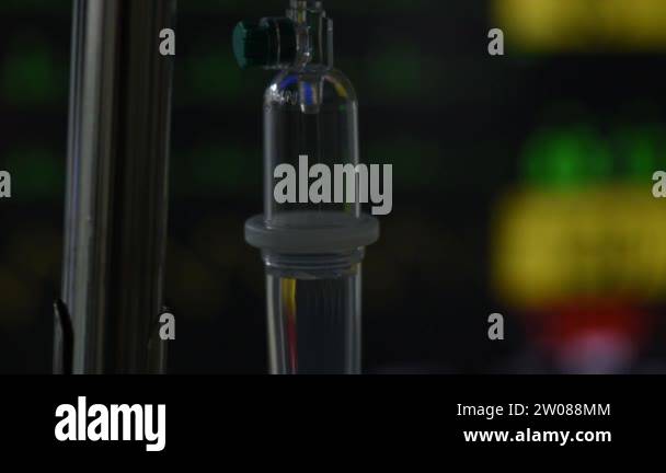 Intravenous fluid in operating room and vital sign monitoring blinking ...