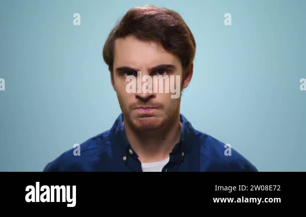 Angry man looking at camera. Male model with aggressive face expression ...