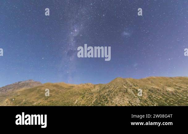 Andes mountains nightscape - The Milky Way and Magellanic Clouds moving ...
