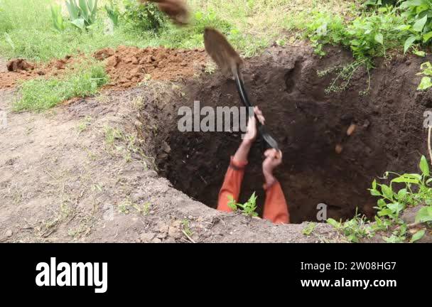 Man digging a deep hole Stock Videos & Footage - HD and 4K Video Clips ...