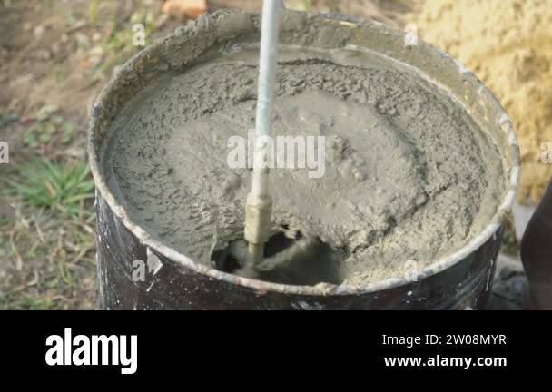 Mixing mortar from cement water Stock Videos & Footage - HD and 4K ...
