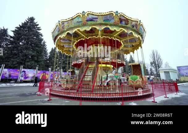 Ukraine, Kyiv, February 15, 2020. Carousel with lots of lights is ...