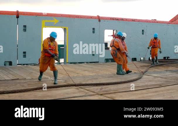Anchor-handling Tug Supply AHTS vessel crew preparing vessel Stock Video Footage - Alamy