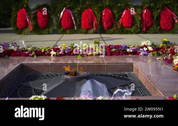 Eternal Flame memorial monument with star at Tomb of Unknown Soldier ...