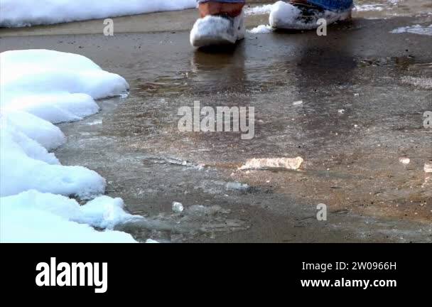 Spreading salt sidewalk Stock Videos & Footage - HD and 4K Video Clips ...