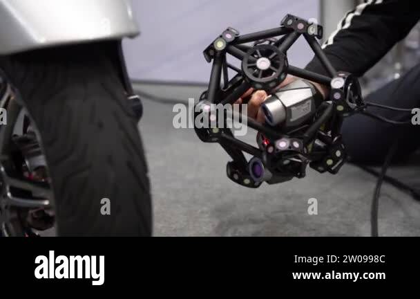 , Taiwan-26 April, 2019: 4K, Man hand scanning a motorcycle using a ...