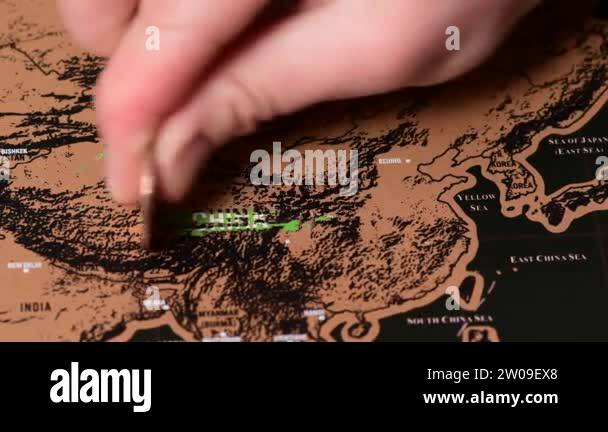one dollar coin on black scratch travel map of China, Asia Stock Video ...