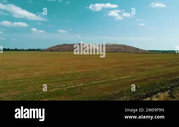 Huge garbage dump pyramid of garbage. Panoramic view of the mountain of ...