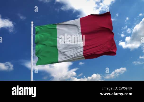 Realistic flag of Italy waving in the wind against deep blue sky ...
