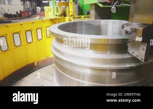 Milling machine cutting the sample part. Turning lathe in action.Facing ...