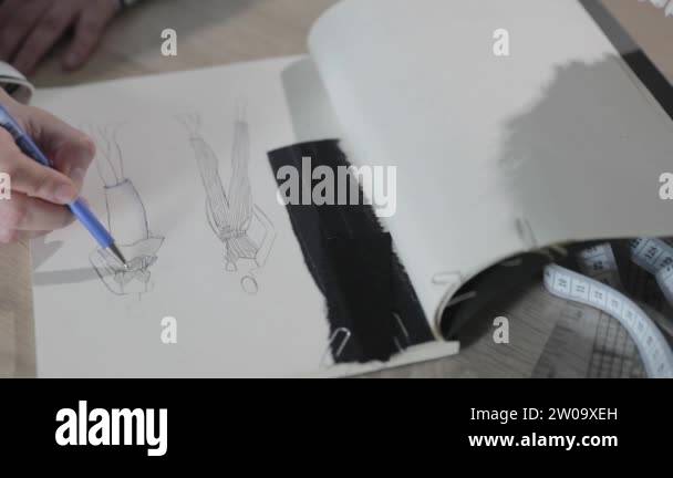 Slow motion video of the girl draws the sketch of future model of ...
