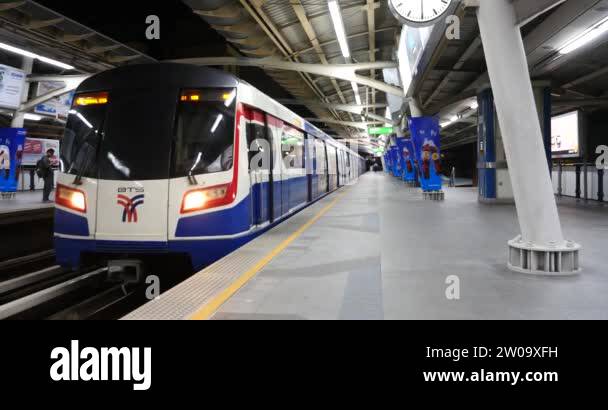 BANGKOK, THAILAND - NOVEMBER 19, 2015: Travellers inside BTS Skytrain ...